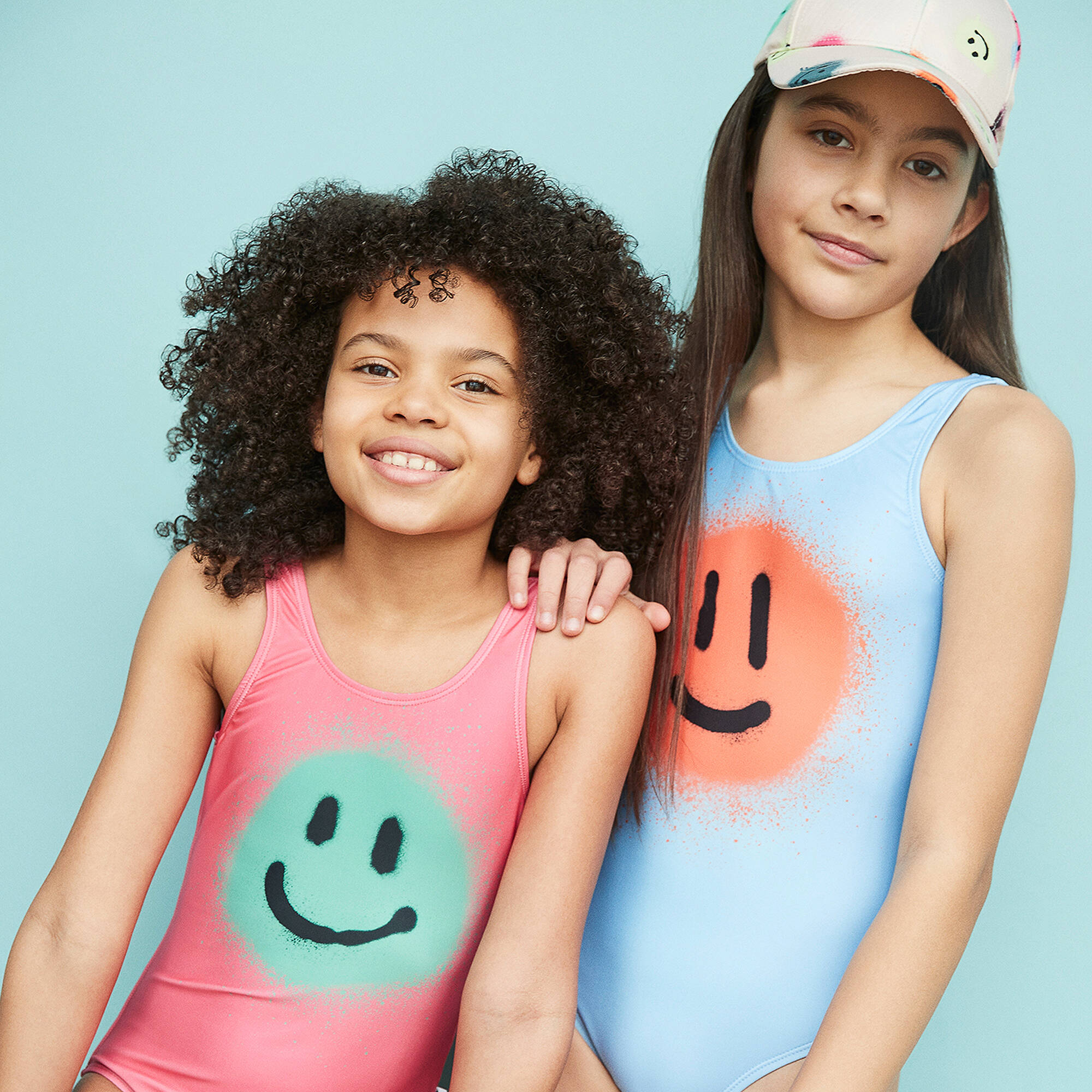 Molo - Girls Pink Smiling Face Swimsuit (UPF50+) | Childrensalon Outlet